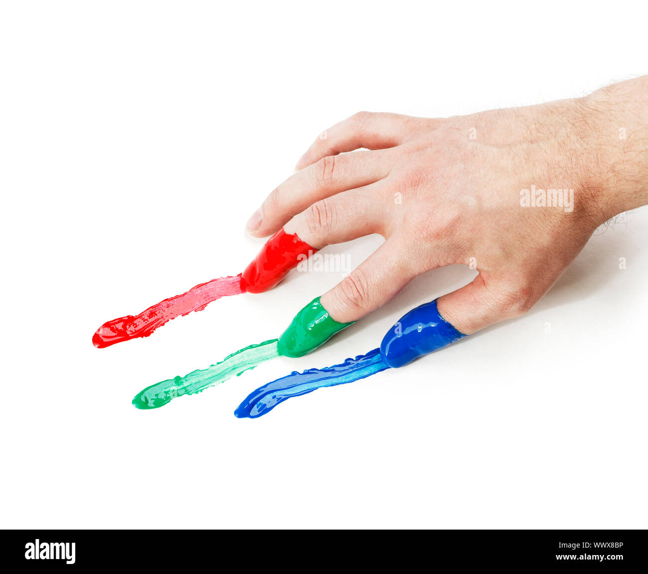 Hand with red, green and blue fingerpaints Stock Photo - Alamy