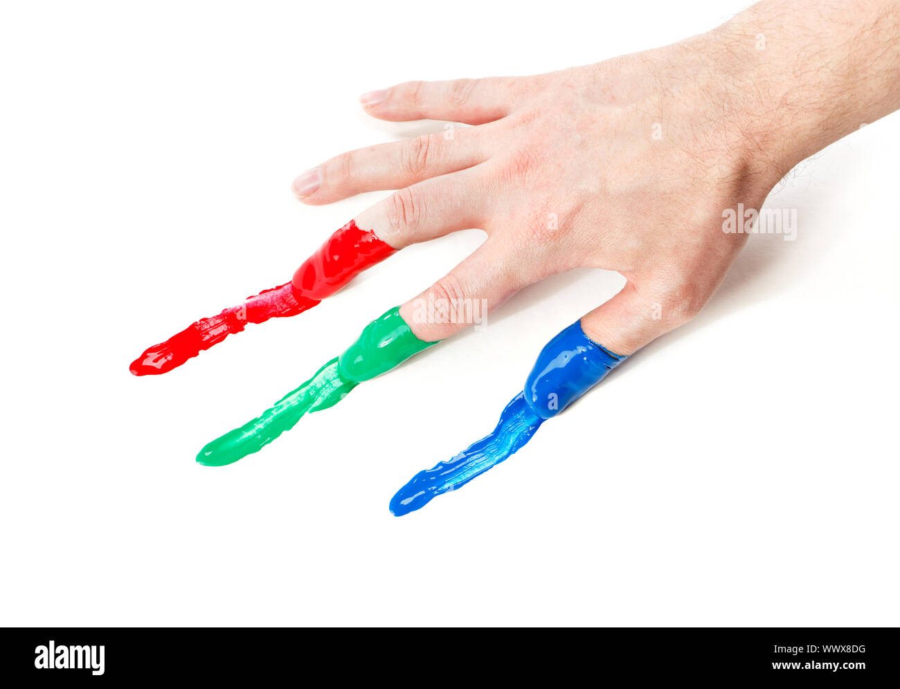 Fingers with fingerpaints in three primary colors, Red, green and blue ...