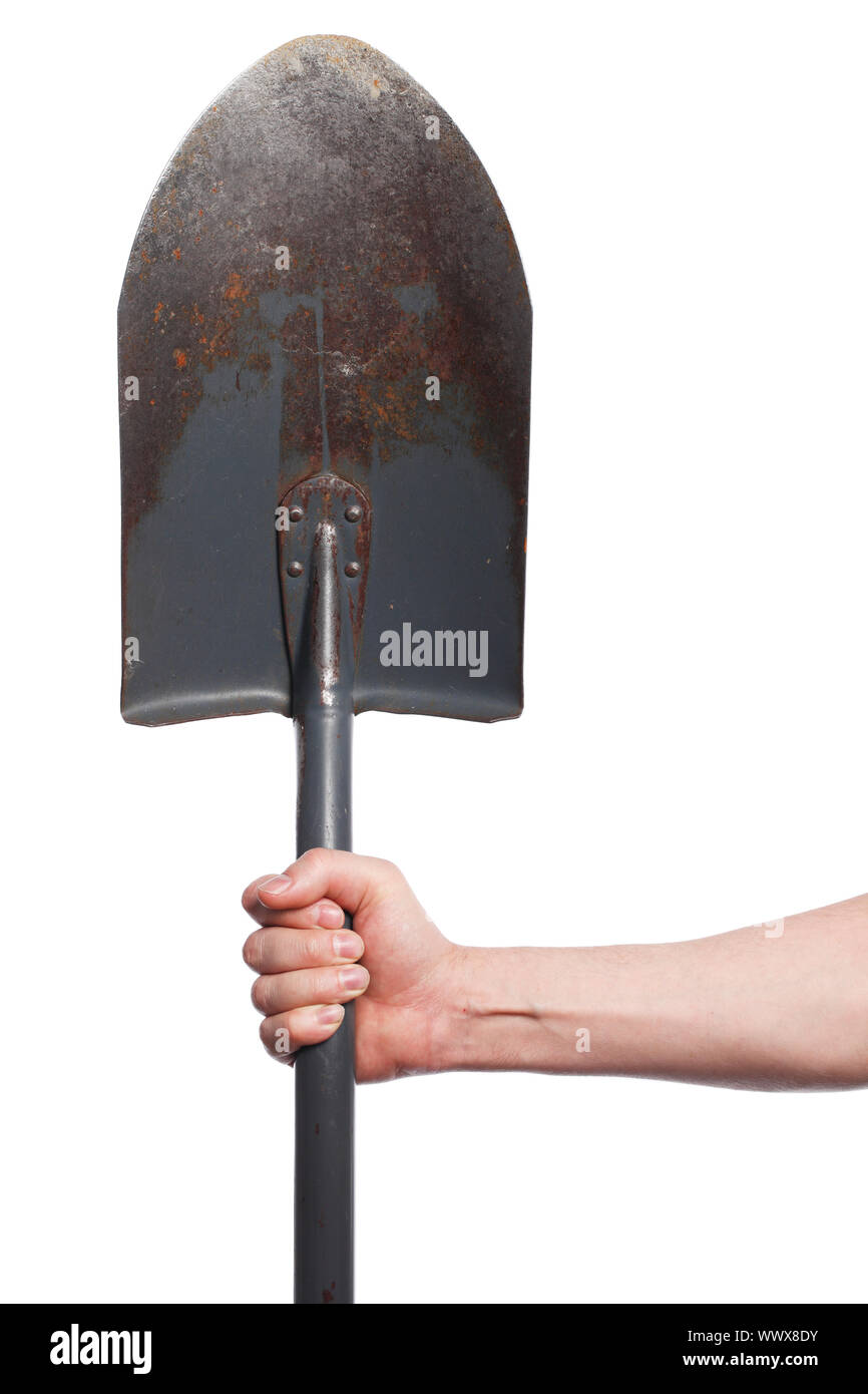 Man holding a worn metallic spade Stock Photo - Alamy