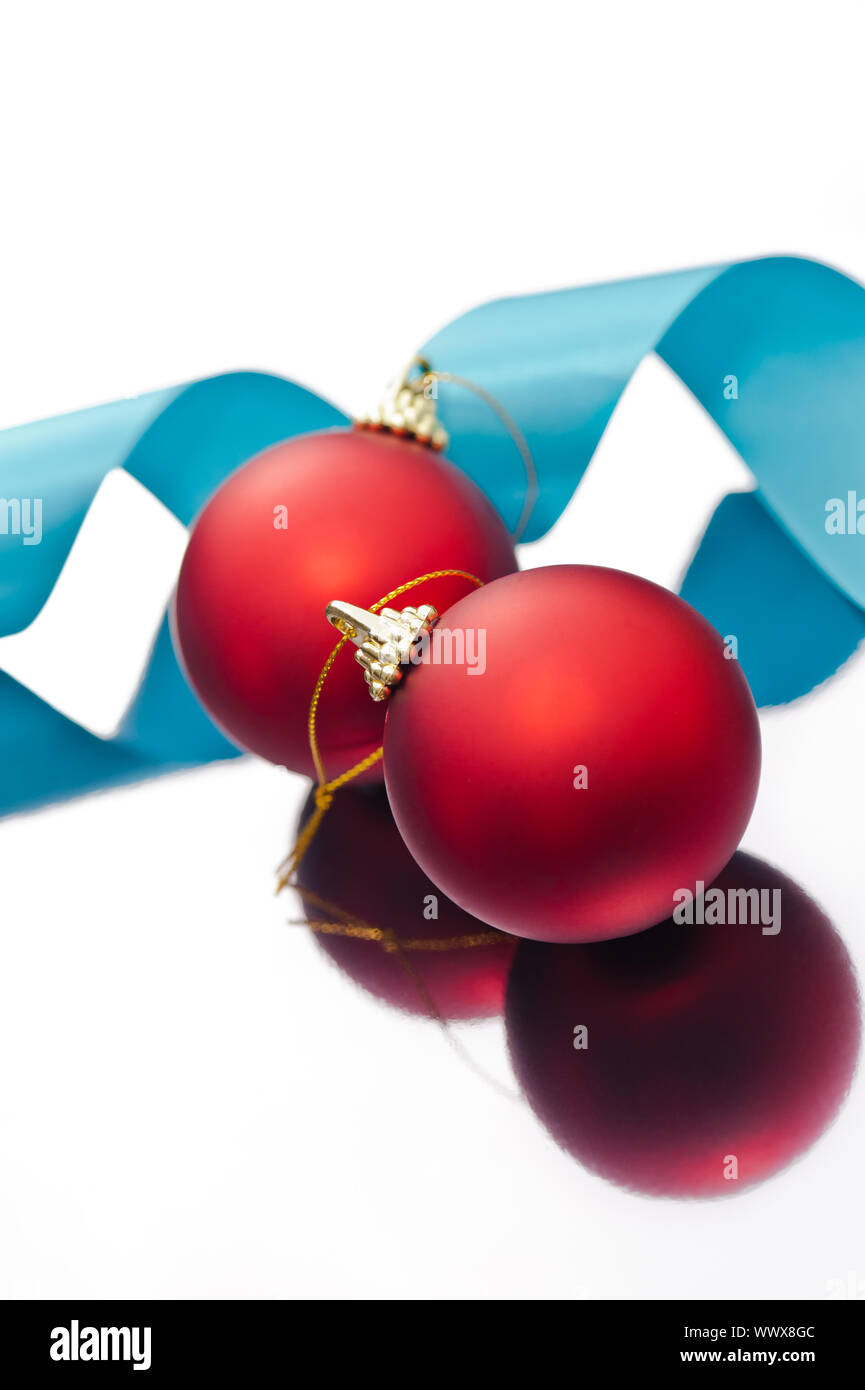 Christmas baubles and a blue ribbon Stock Photo - Alamy