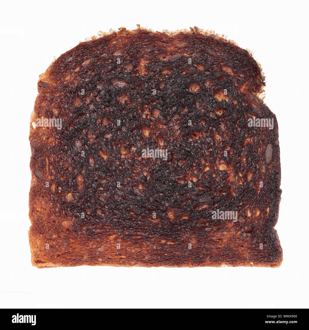 Isolated slice of burned toast Stock Photo - Alamy