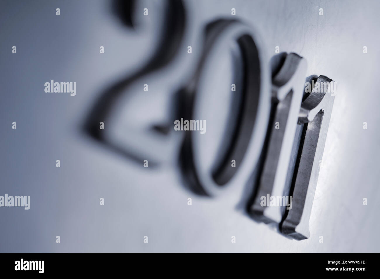 Number (year) 2011 written with metallic letters. Short depth of field ...