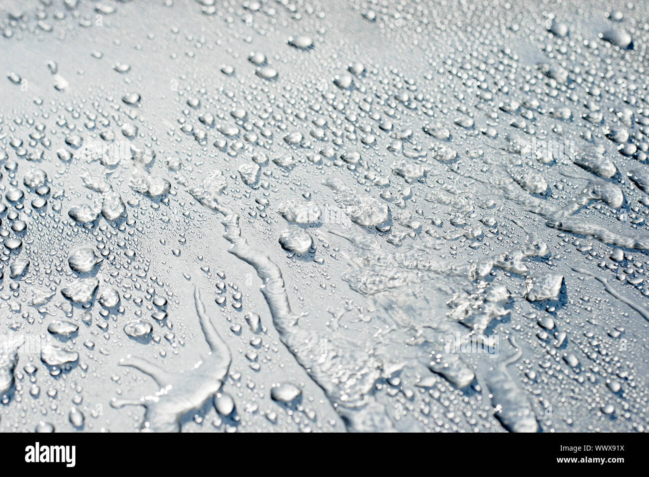 Water spray and droplets on a car. Short depth of field Stock Photo - Alamy