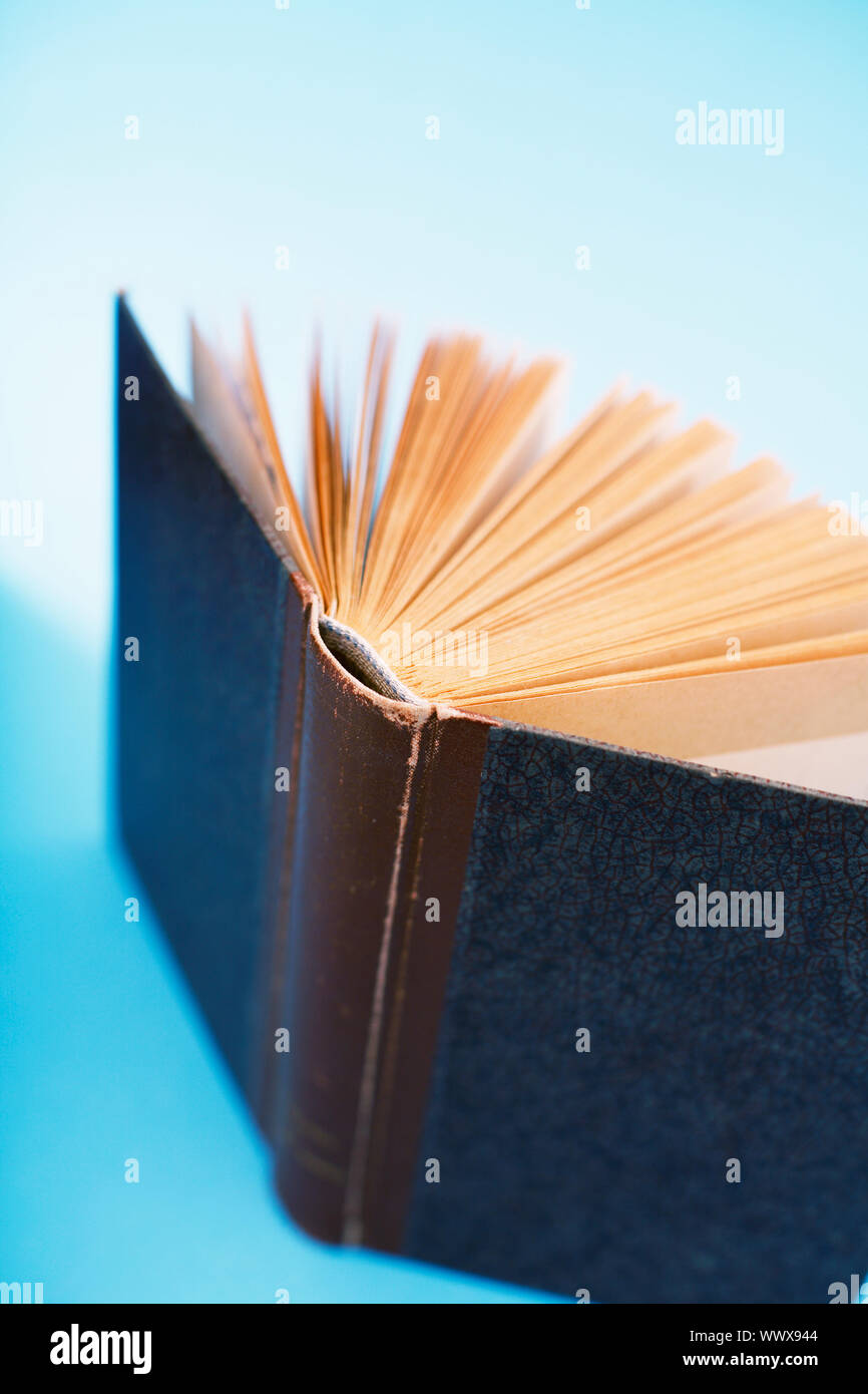 Old open book Stock Photo - Alamy