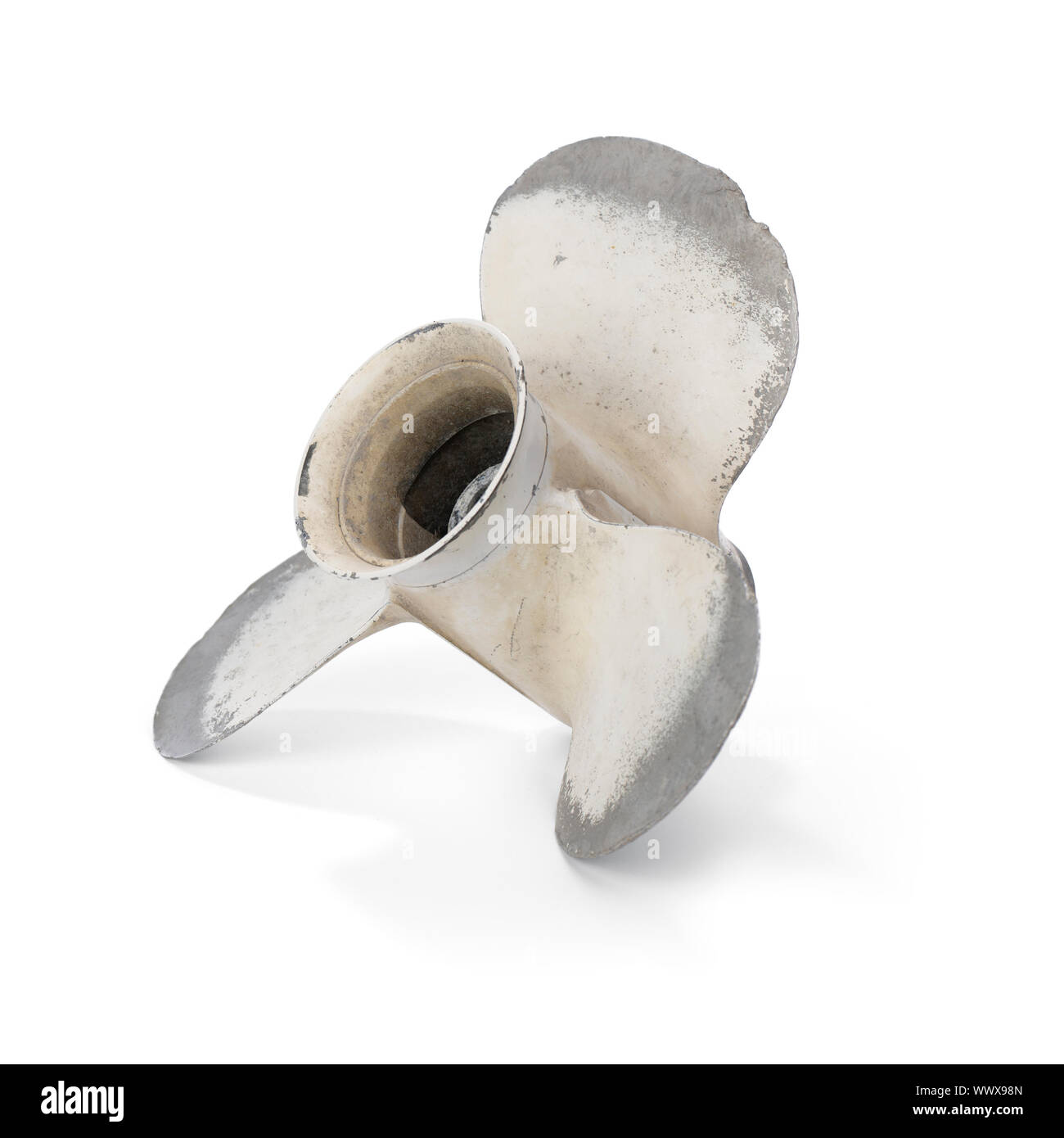 Old worn and damaged outboard engine propeller isolated on white with ...