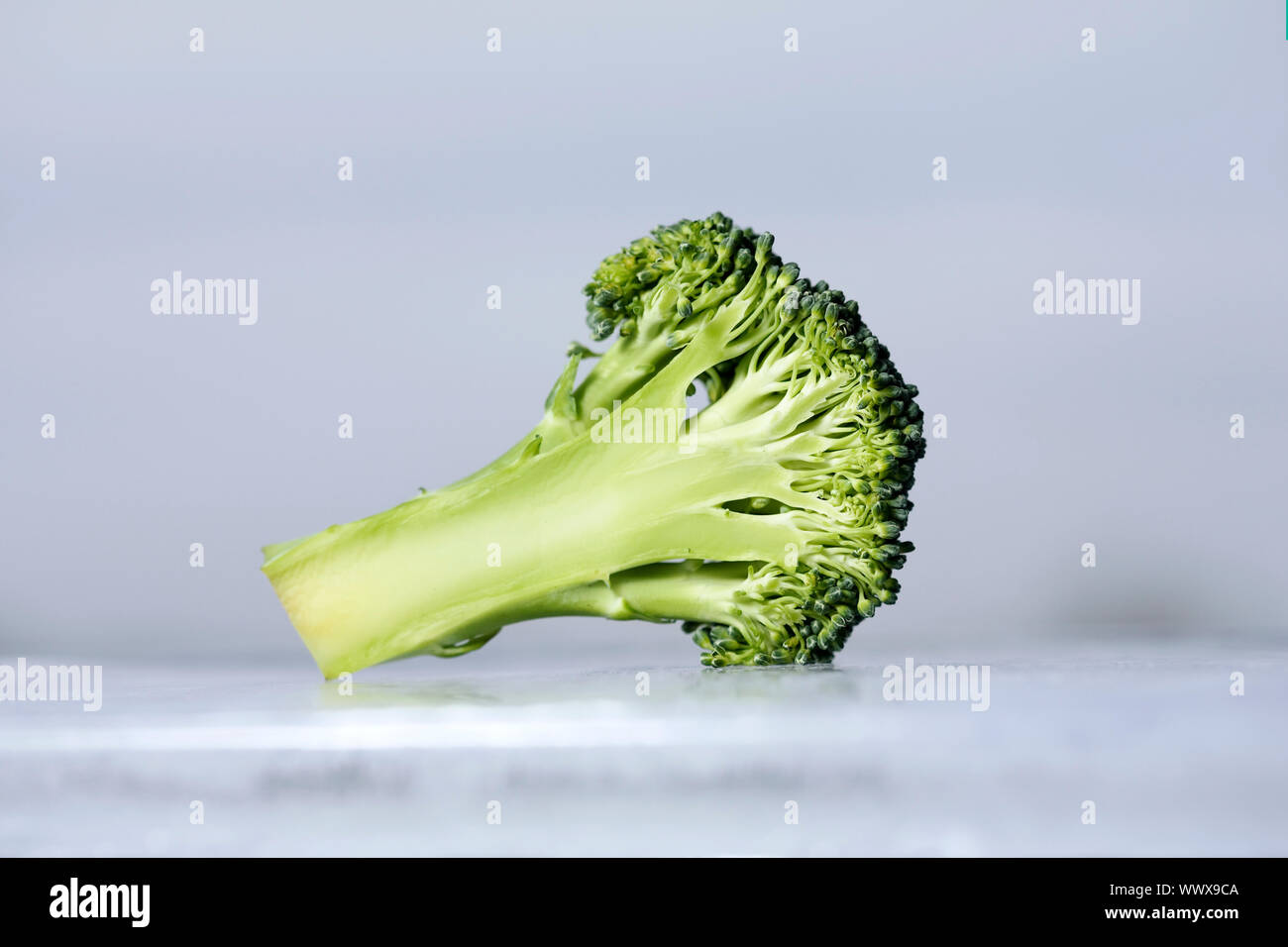 A Piece of broccoli on ice Stock Photo - Alamy
