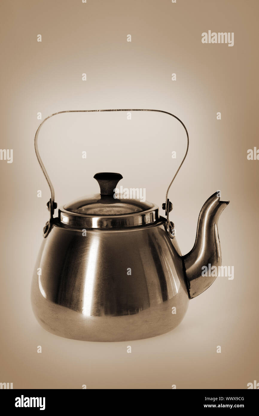 Old metallic coffee pot, sepia toned Stock Photo - Alamy