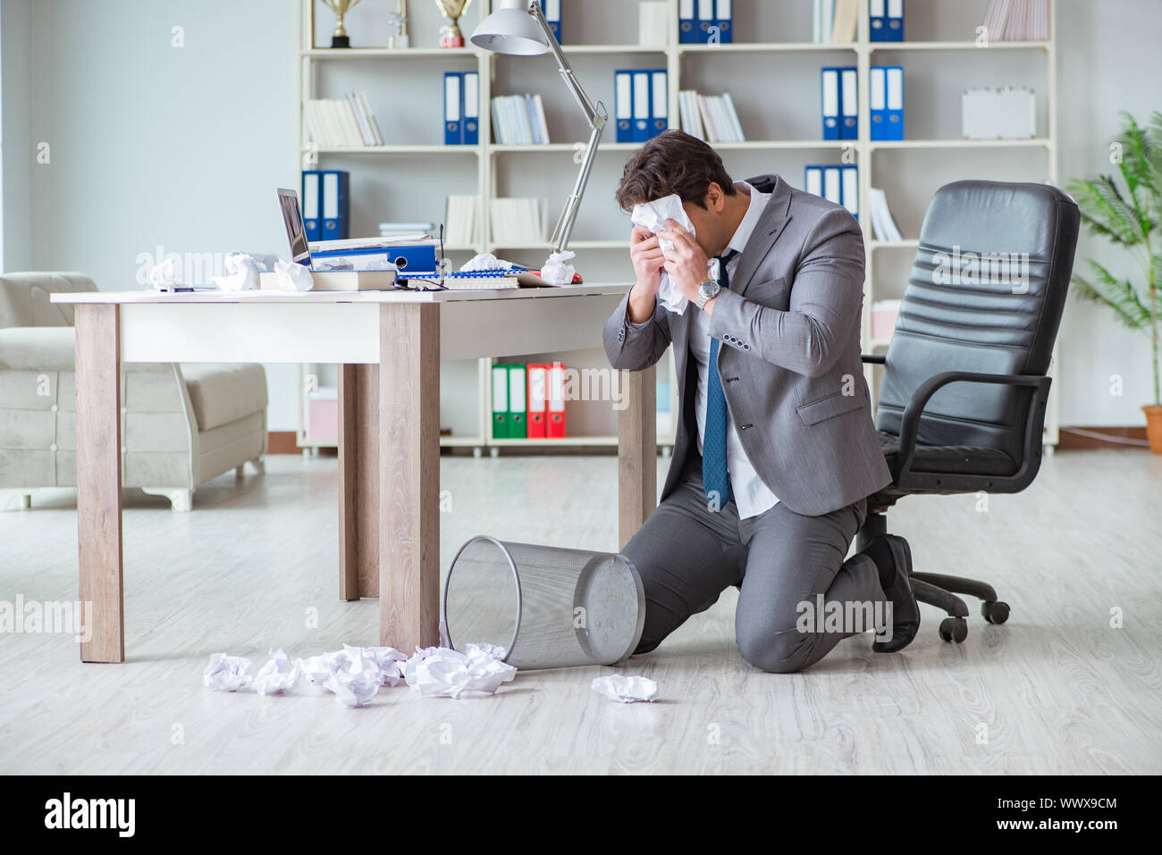 Businessman having fun taking a break in the office at work Stock Photo ...