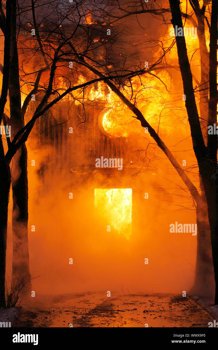 Old wooden house burning in flames Stock Photo - Alamy