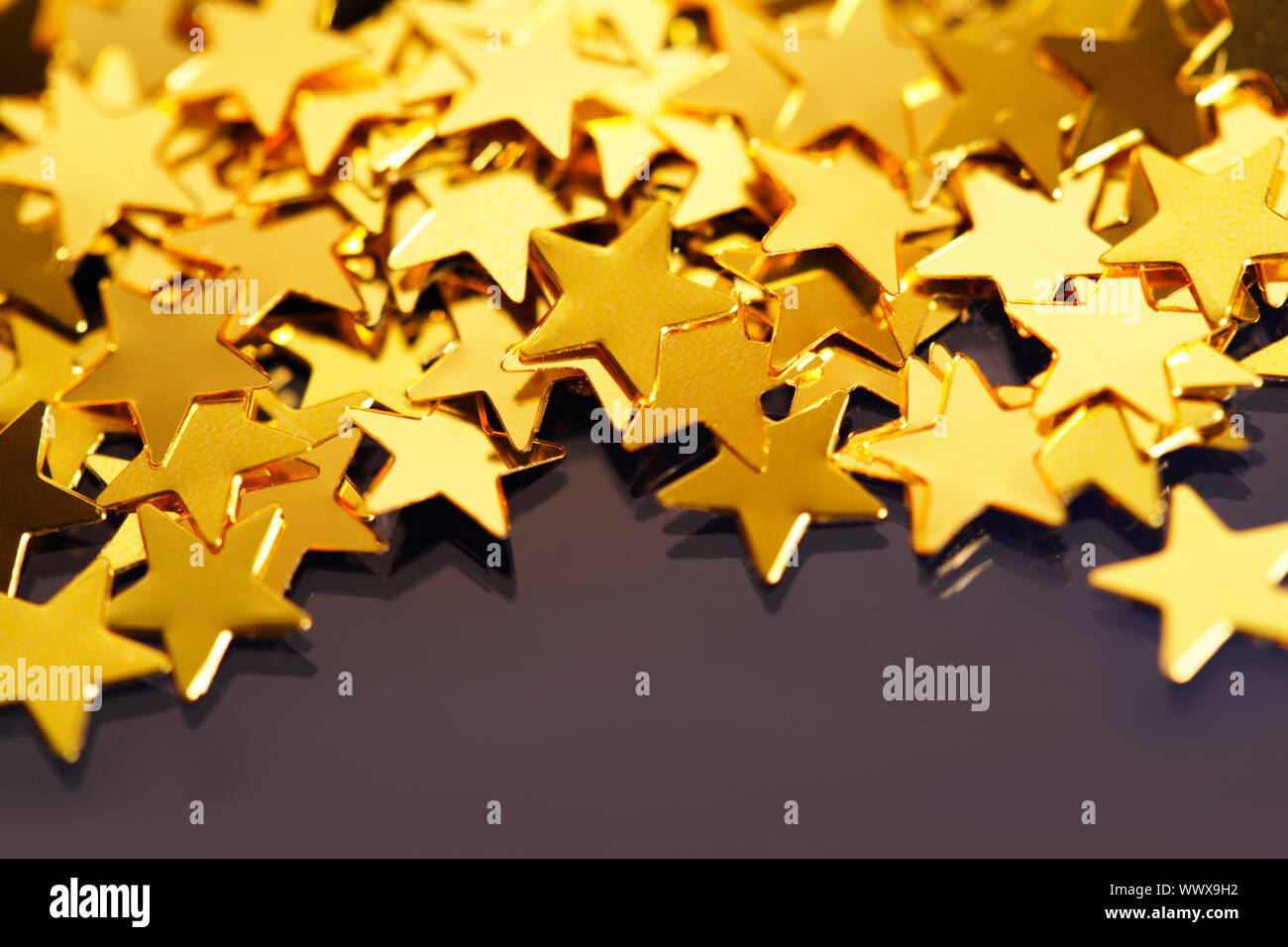 Tiny gold stars hi-res stock photography and images - Alamy