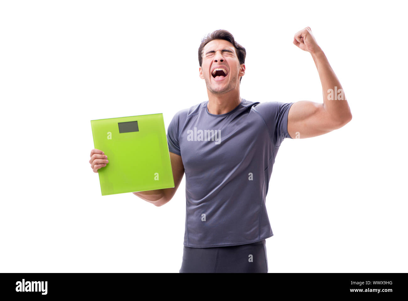 Man with scales in sports and health concept isolated on white Stock ...