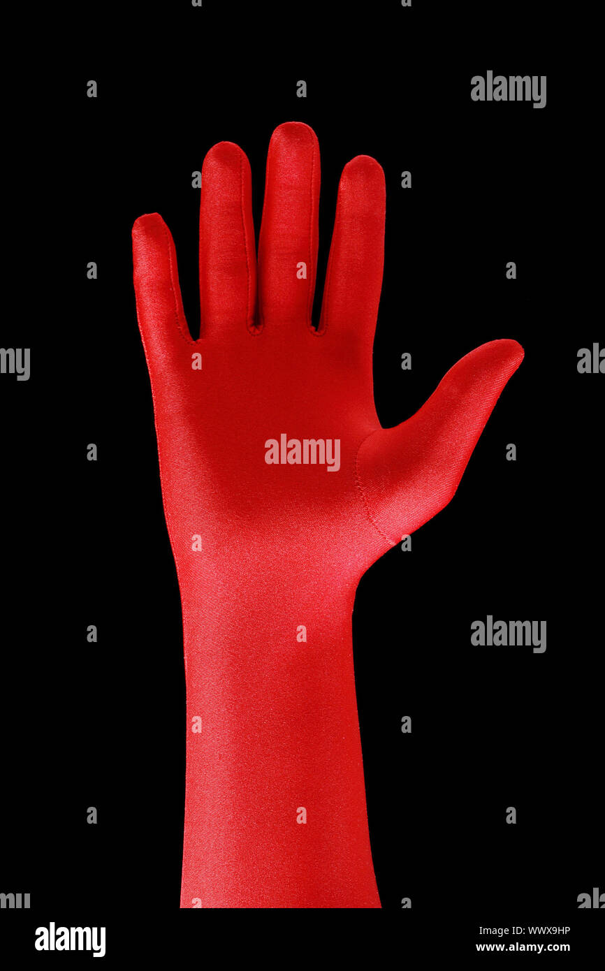 Strange hand with a red glove Stock Photo - Alamy