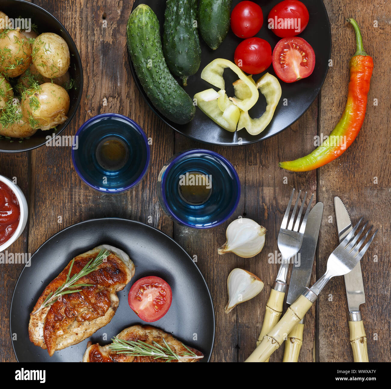 The concept of authentic food, home cooking. Dining table with various ...