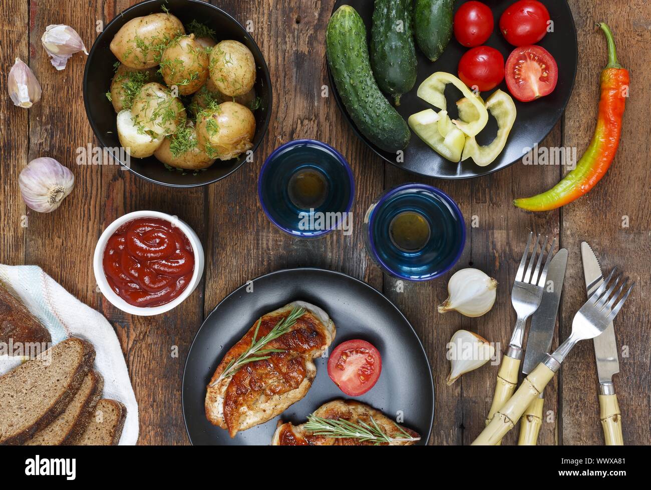 The concept of authentic food, home cooking. Dining table with various ...