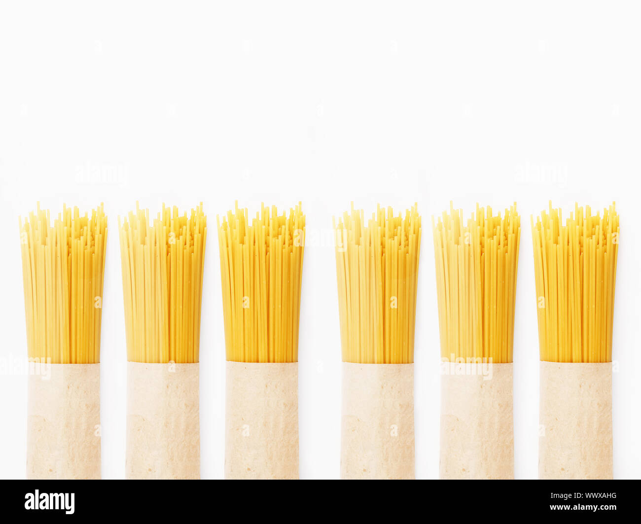 Supermarket. Spaghetti packed into paper on a white background Stock ...