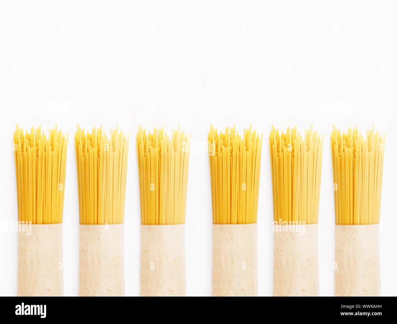 Supermarket. Spaghetti packed into paper on a white background Stock ...