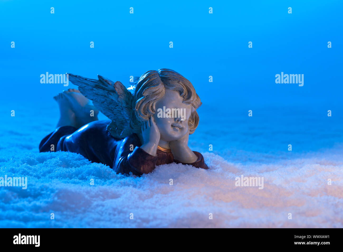 Angel in snow Stock Photo - Alamy