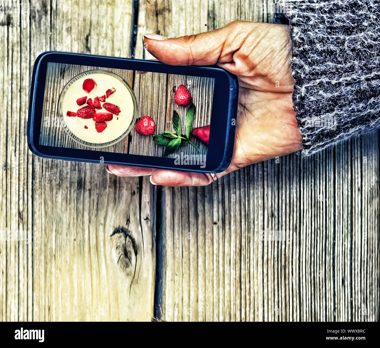 Smartphone in a female hand. Healthy Eating. display image of ...