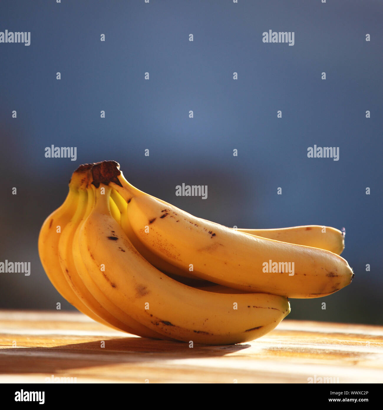 fresh bananas in sunrise light Stock Photo - Alamy