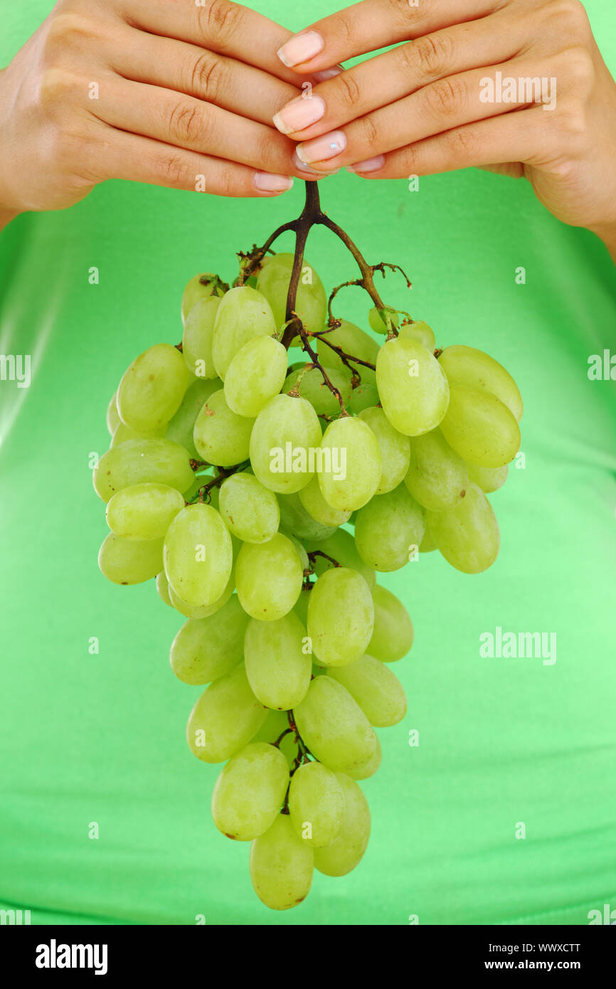 grape in woman hands close up Stock Photo - Alamy