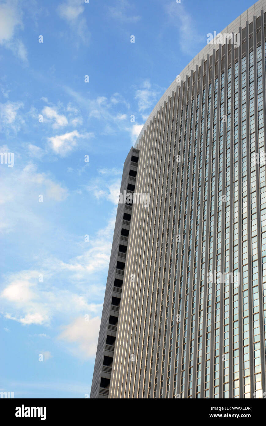 The top of a skyscraper on a blue sky background Stock Photo - Alamy