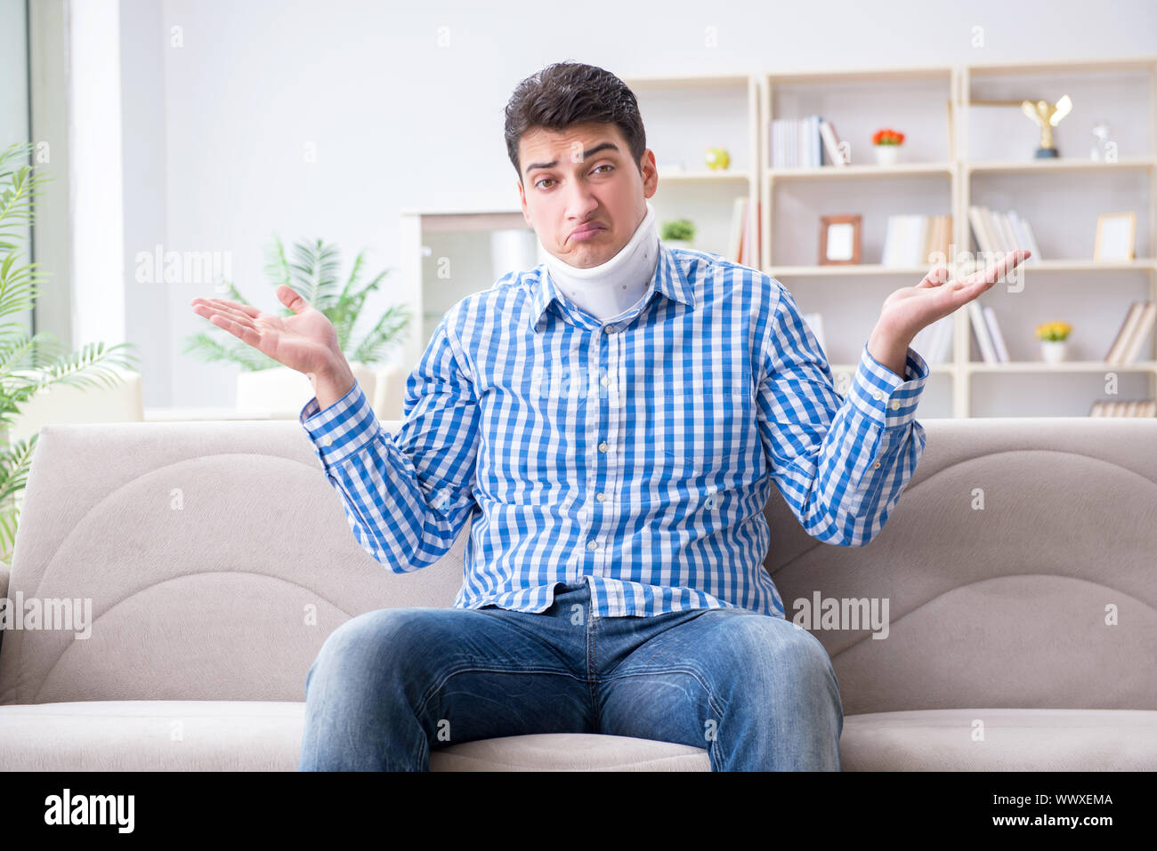 Young man suffering a neck spine head trauma wearing a cervical Stock ...