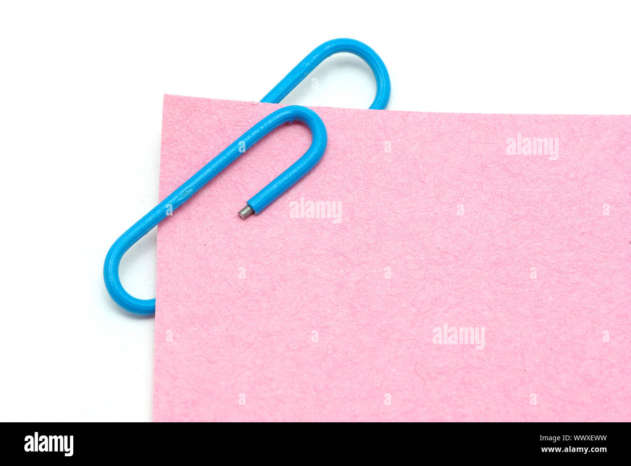 Blank note paper and red paper-clip isolated on white Stock Photo - Alamy