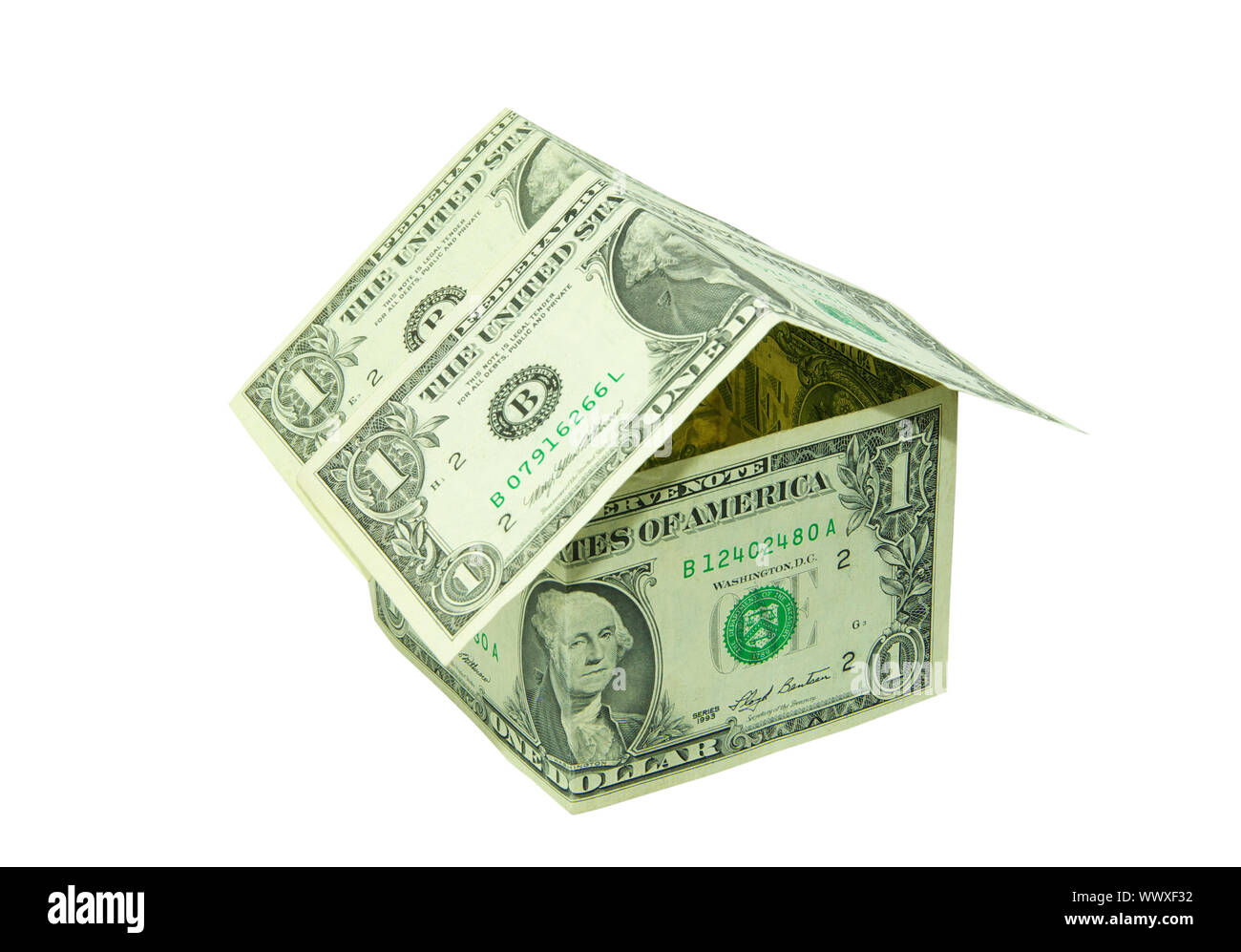 Money house isolated on white background Stock Photo - Alamy