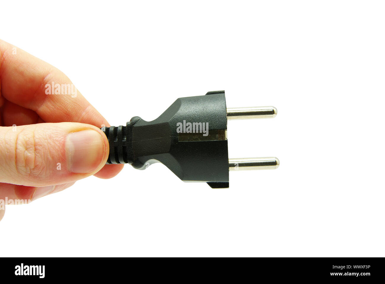 hand with plug over white background Stock Photo - Alamy