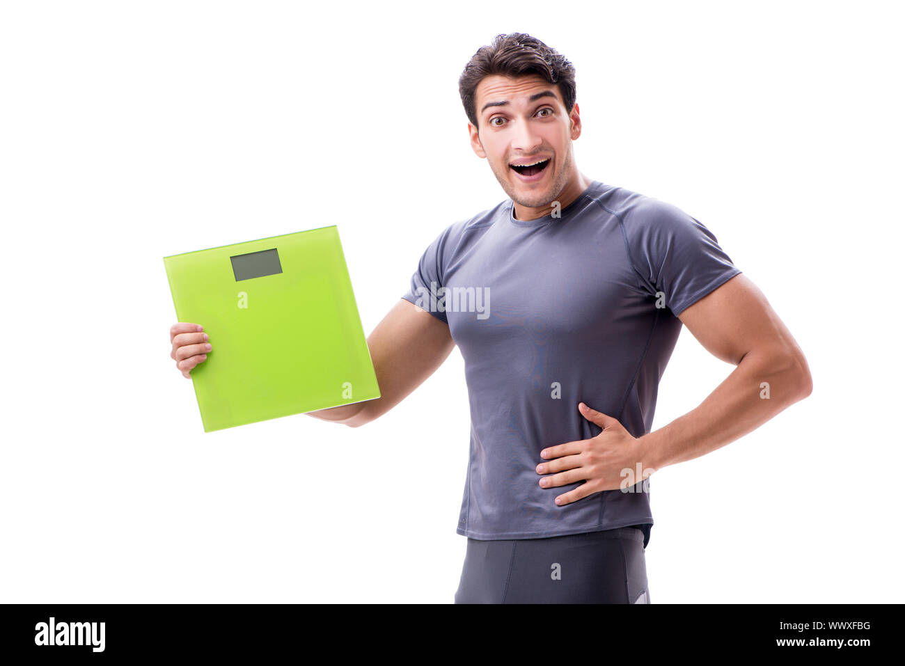 Man with scales in sports and health concept isolated on white Stock ...