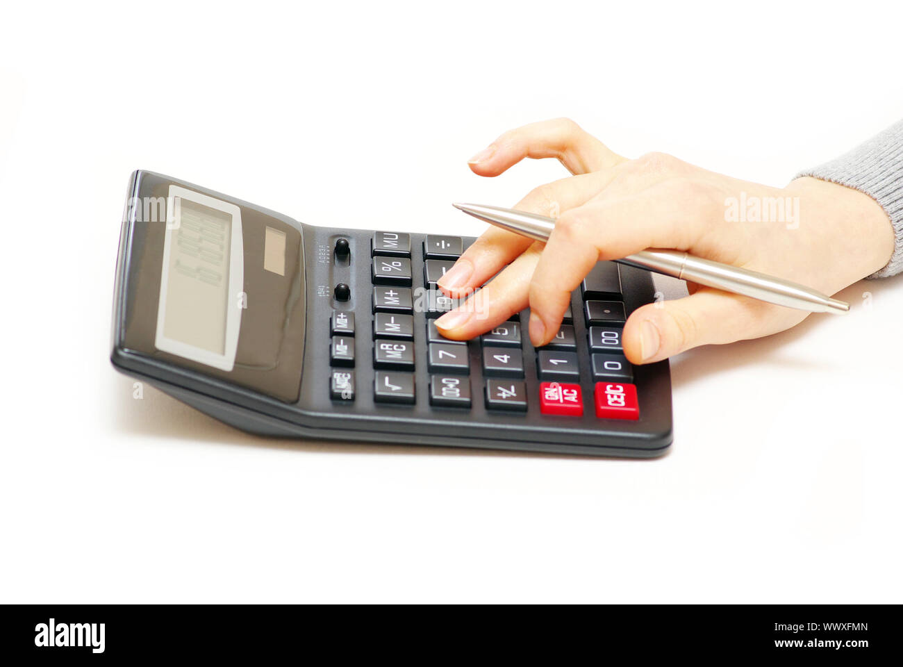 calculator with finger isolated on white Stock Photo - Alamy