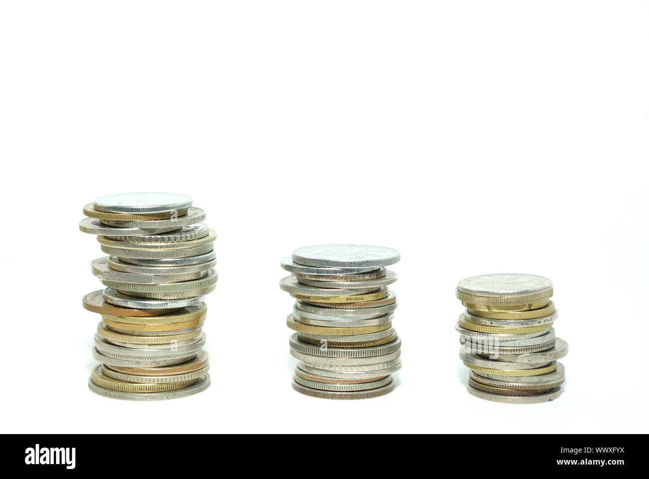 Coin pile isolated on white background Stock Photo - Alamy