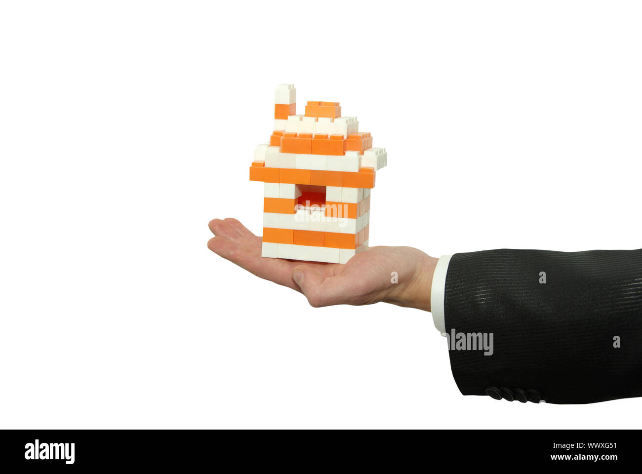 hand holding house isolated on white Stock Photo - Alamy