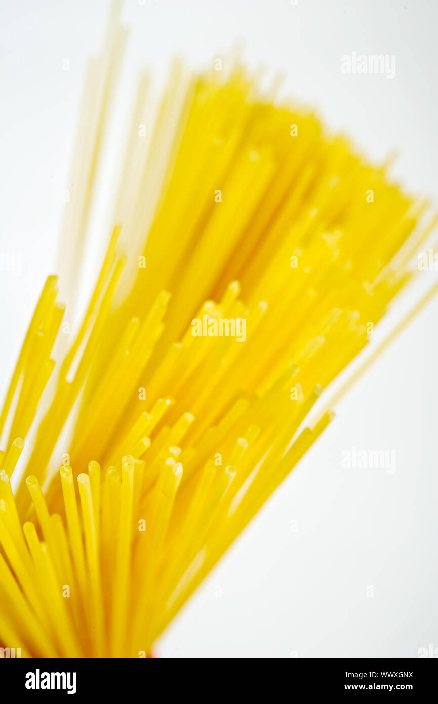 Closeup spaghetti isolated on white background Stock Photo - Alamy