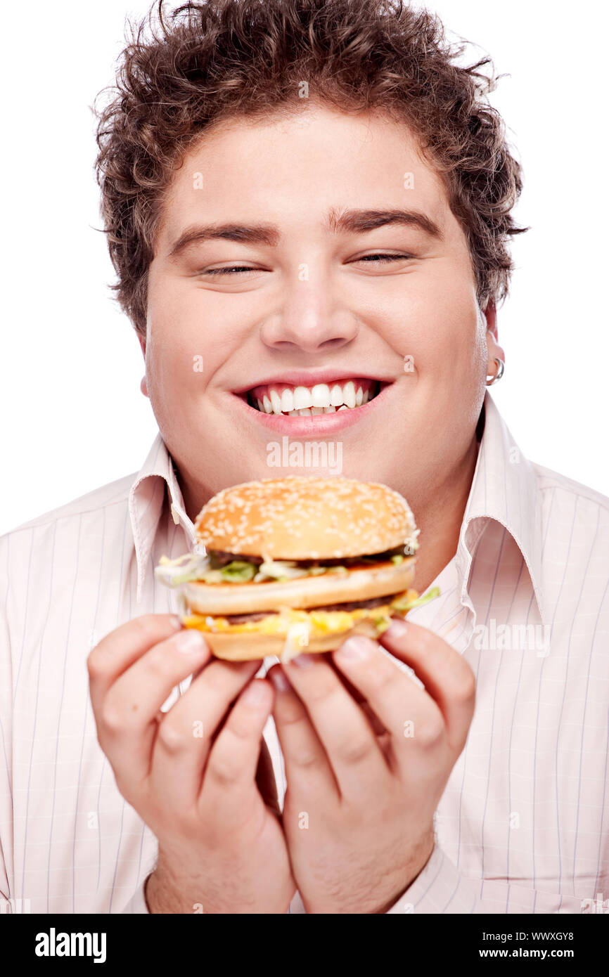 Happy chubby holding a hamburger, isolated on white Stock Photo - Alamy