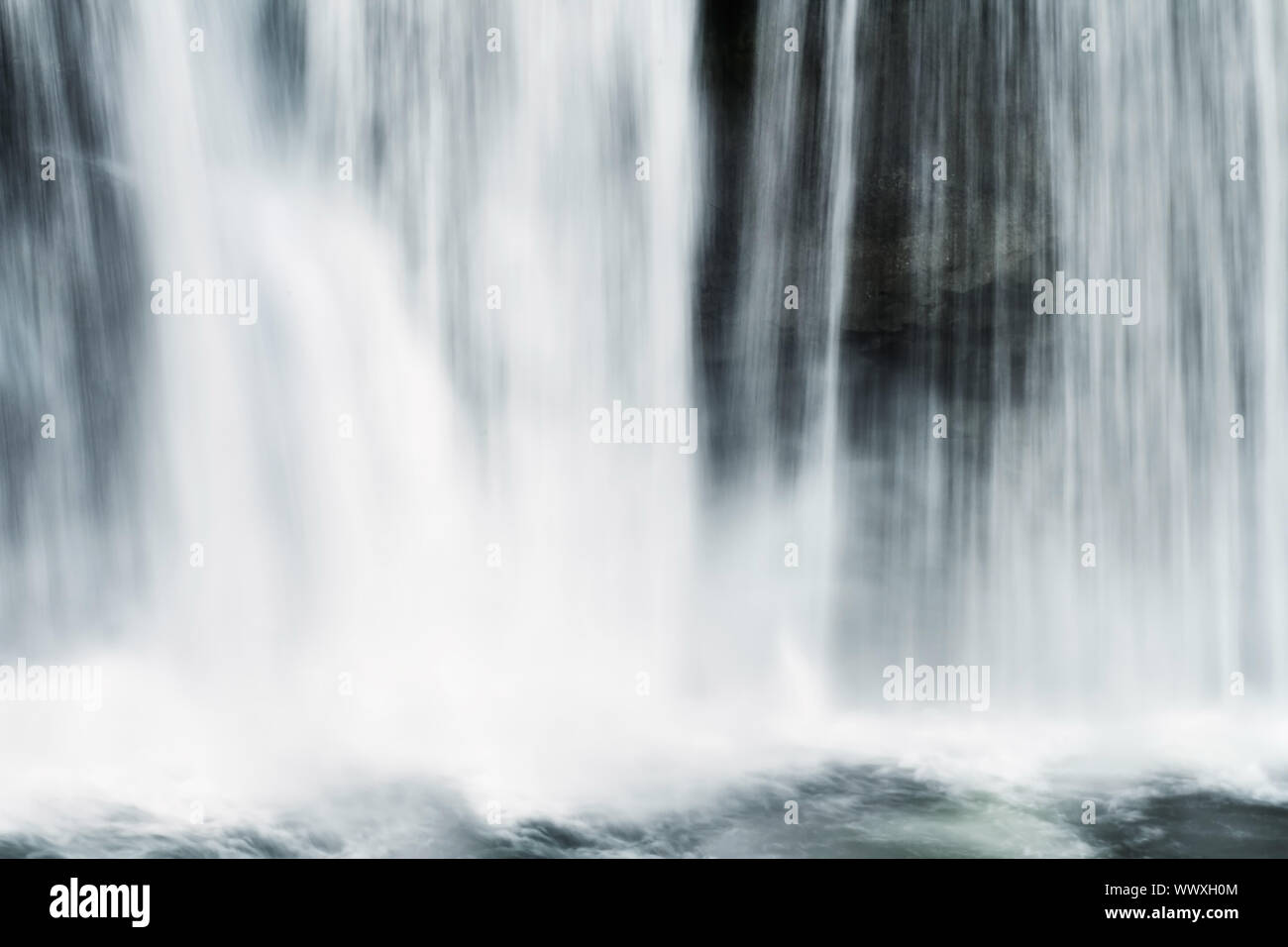 Abstract of flowing water from a waterfall Stock Photo - Alamy