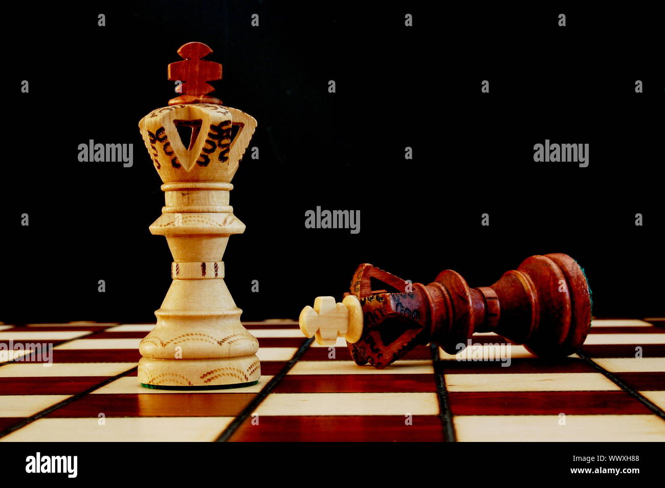 chess pieces on chess board showing power and success Stock Photo - Alamy