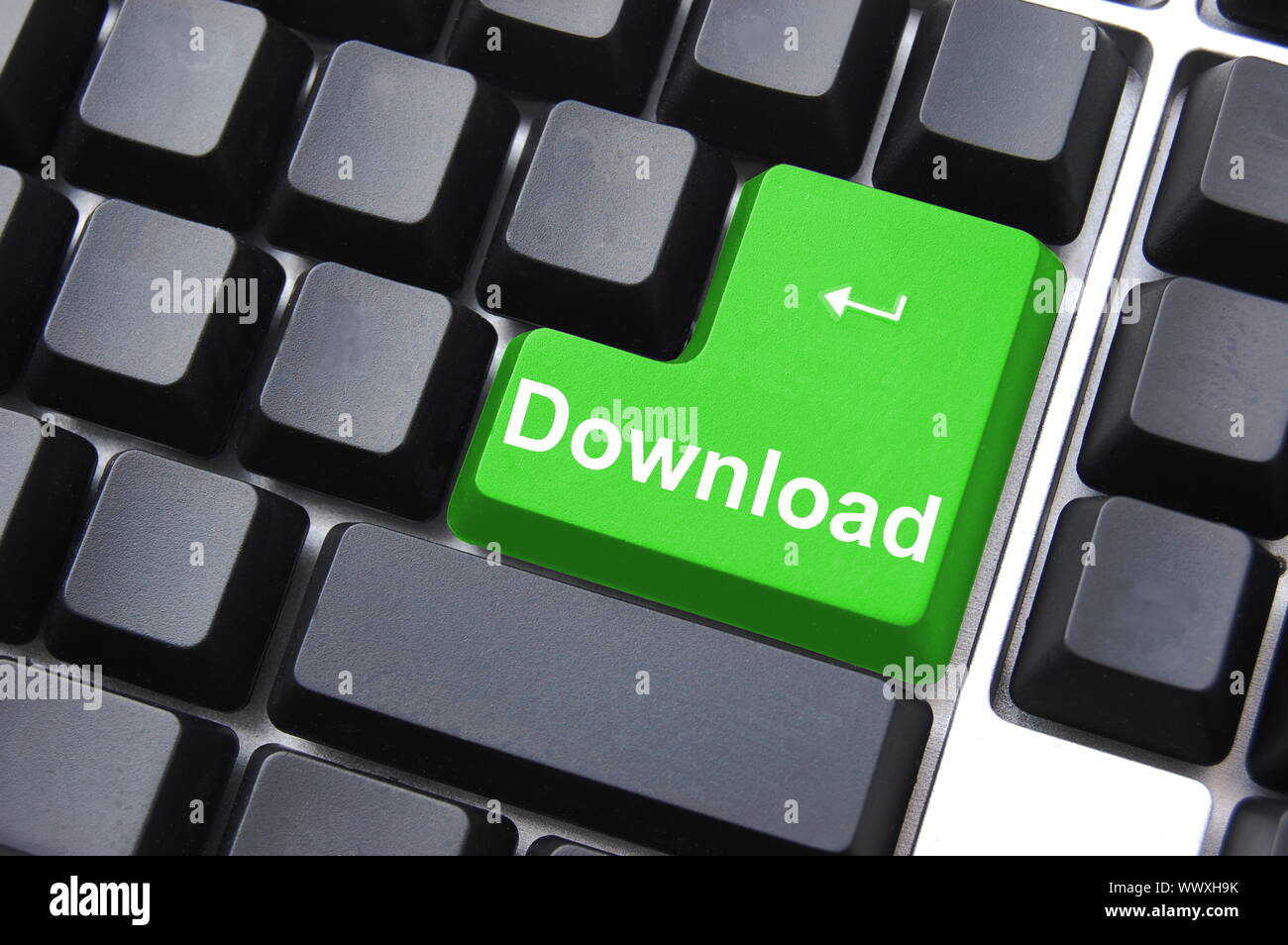 dowload data from the internet with computer button Stock Photo - Alamy
