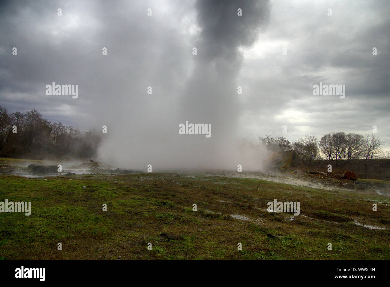 Steam over hot spring Stock Photo - Alamy