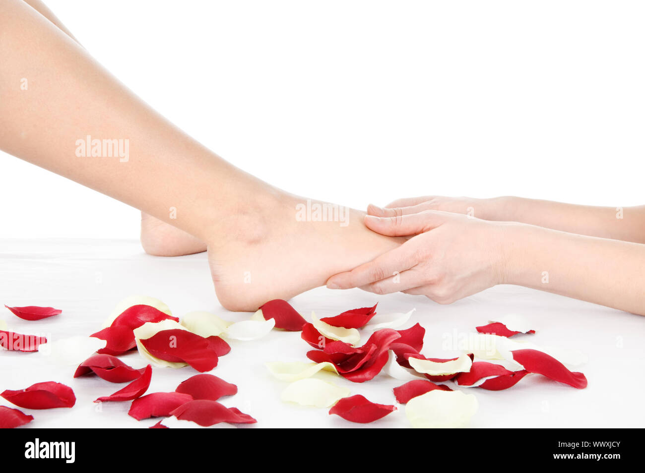 foot massage isolated on white background Stock Photo - Alamy