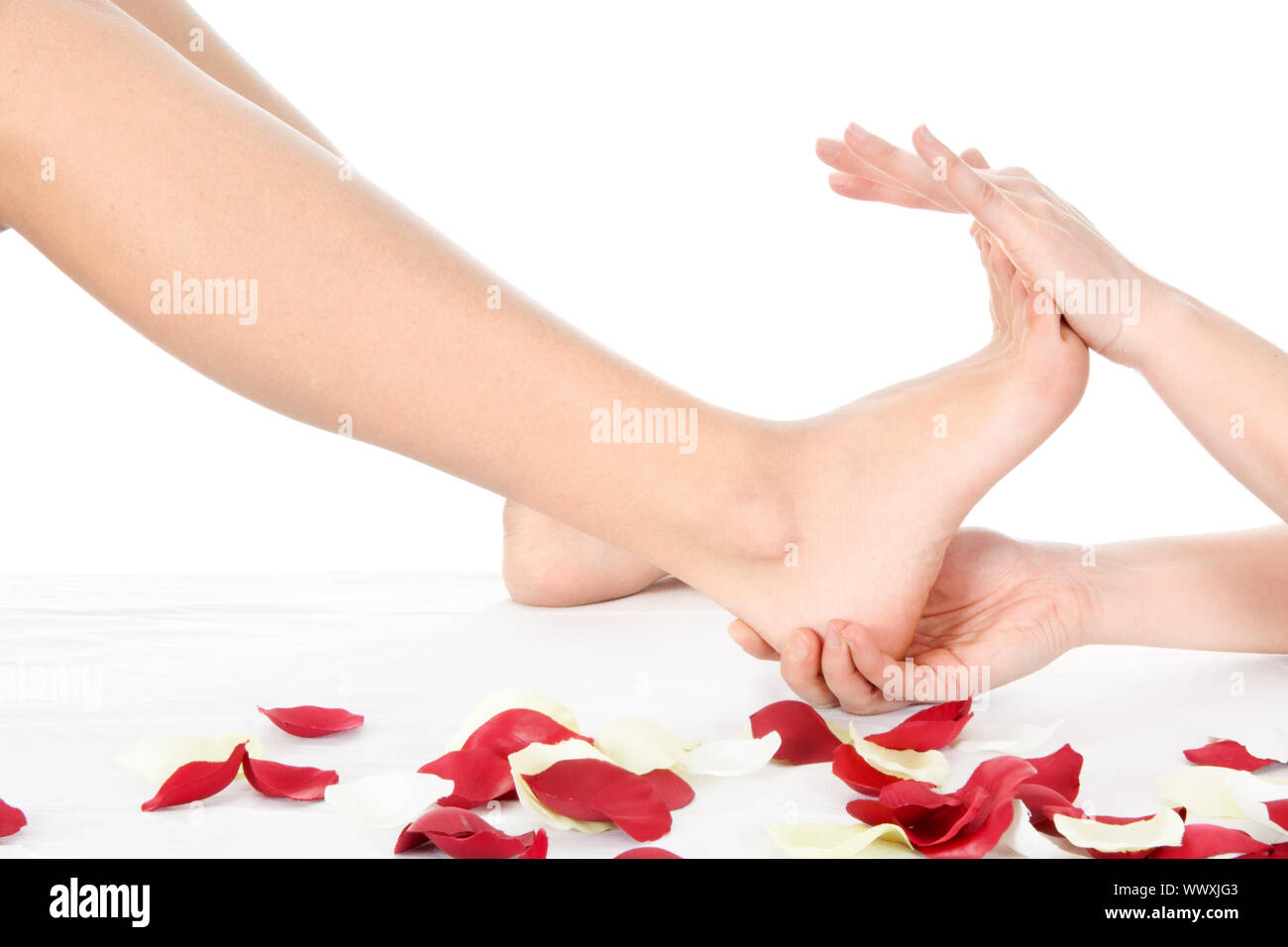 foot massage isolated on white background Stock Photo - Alamy