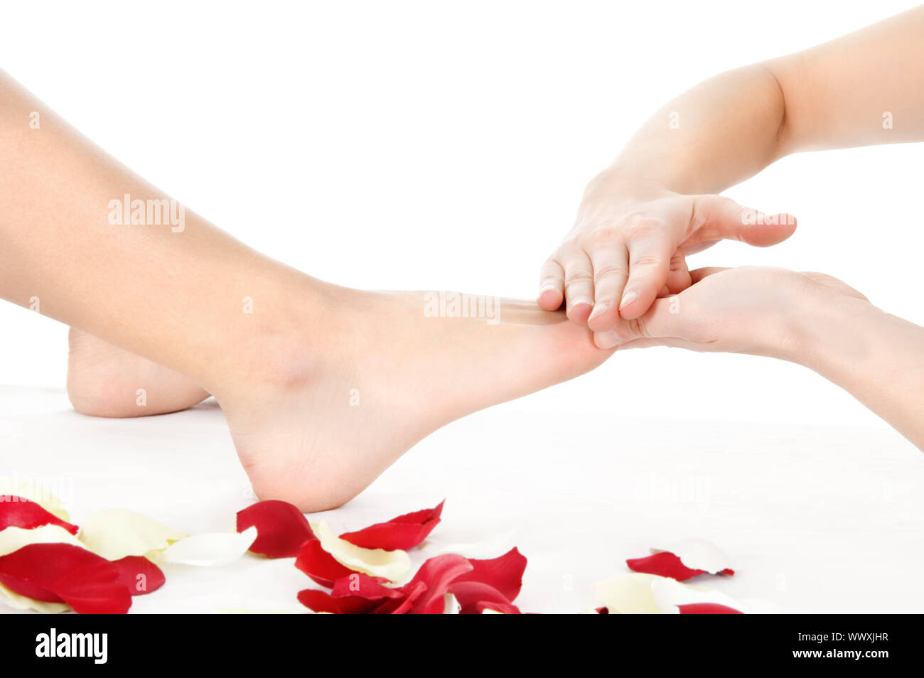 foot massage isolated on white background Stock Photo - Alamy