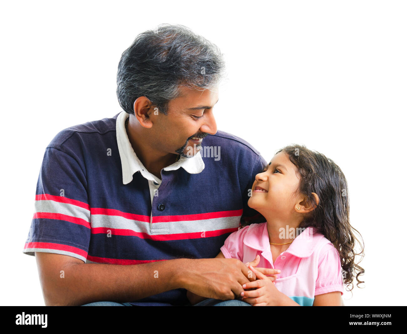 Asian Indian father having conversation with her daughter over white ...