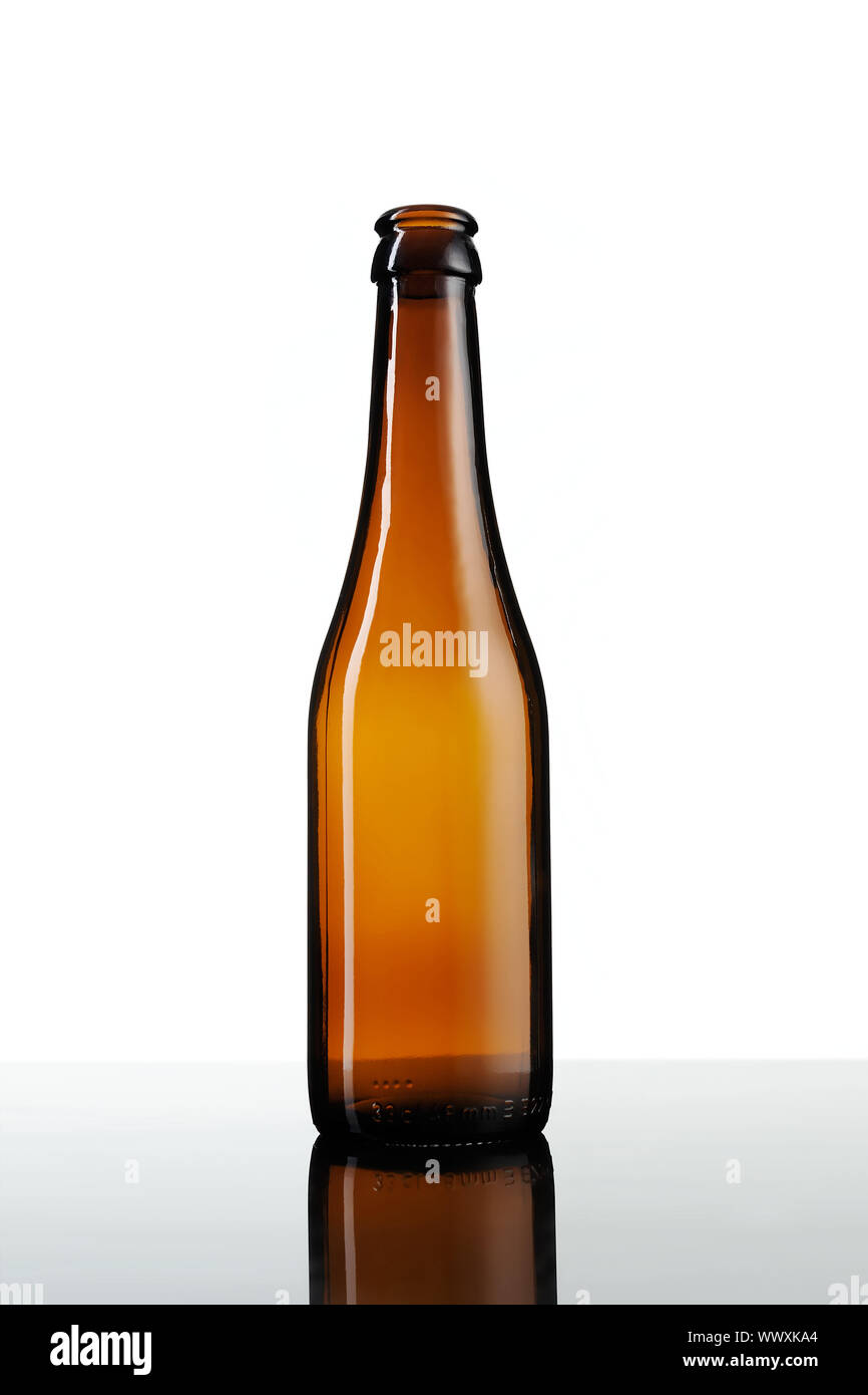 Empty bottle of beer isolated on white background Stock Photo - Alamy