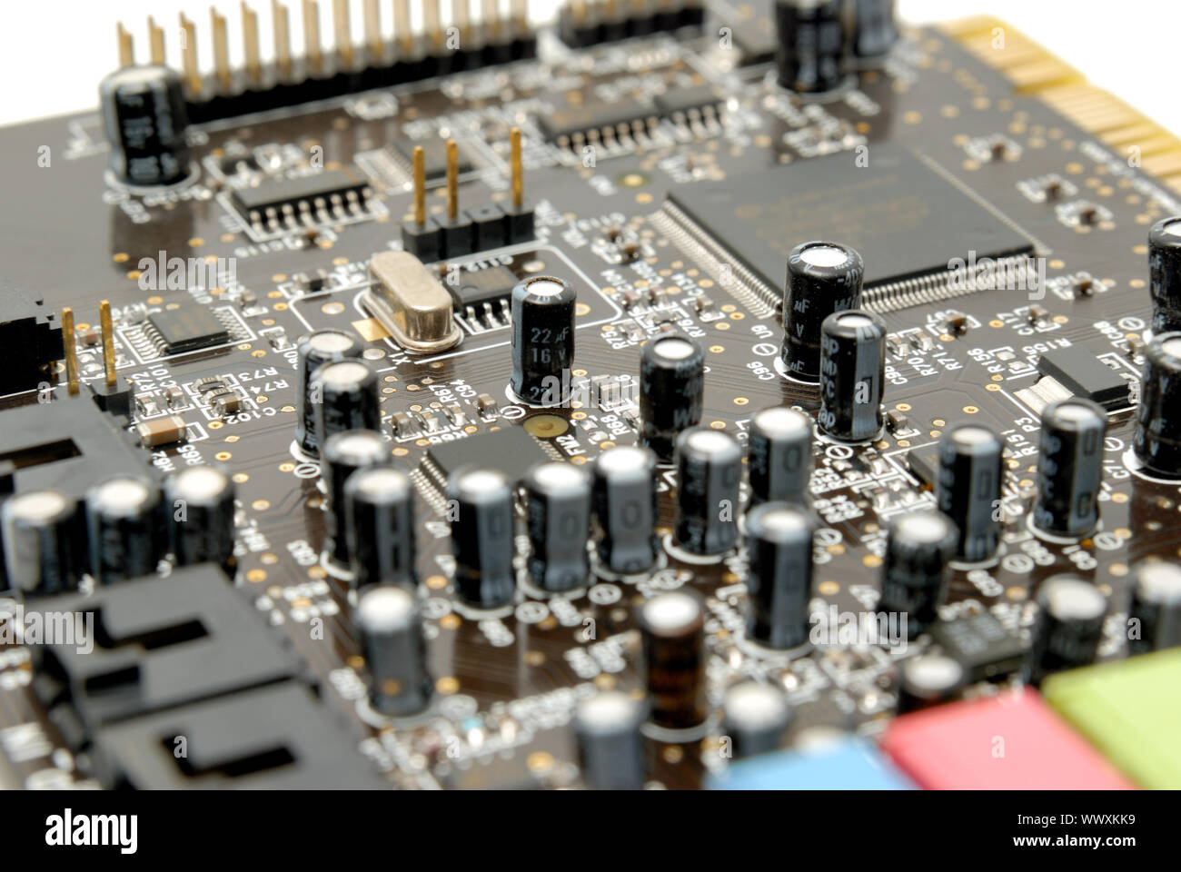 The printed-circuit-board with computer chips resistors and condensers ...