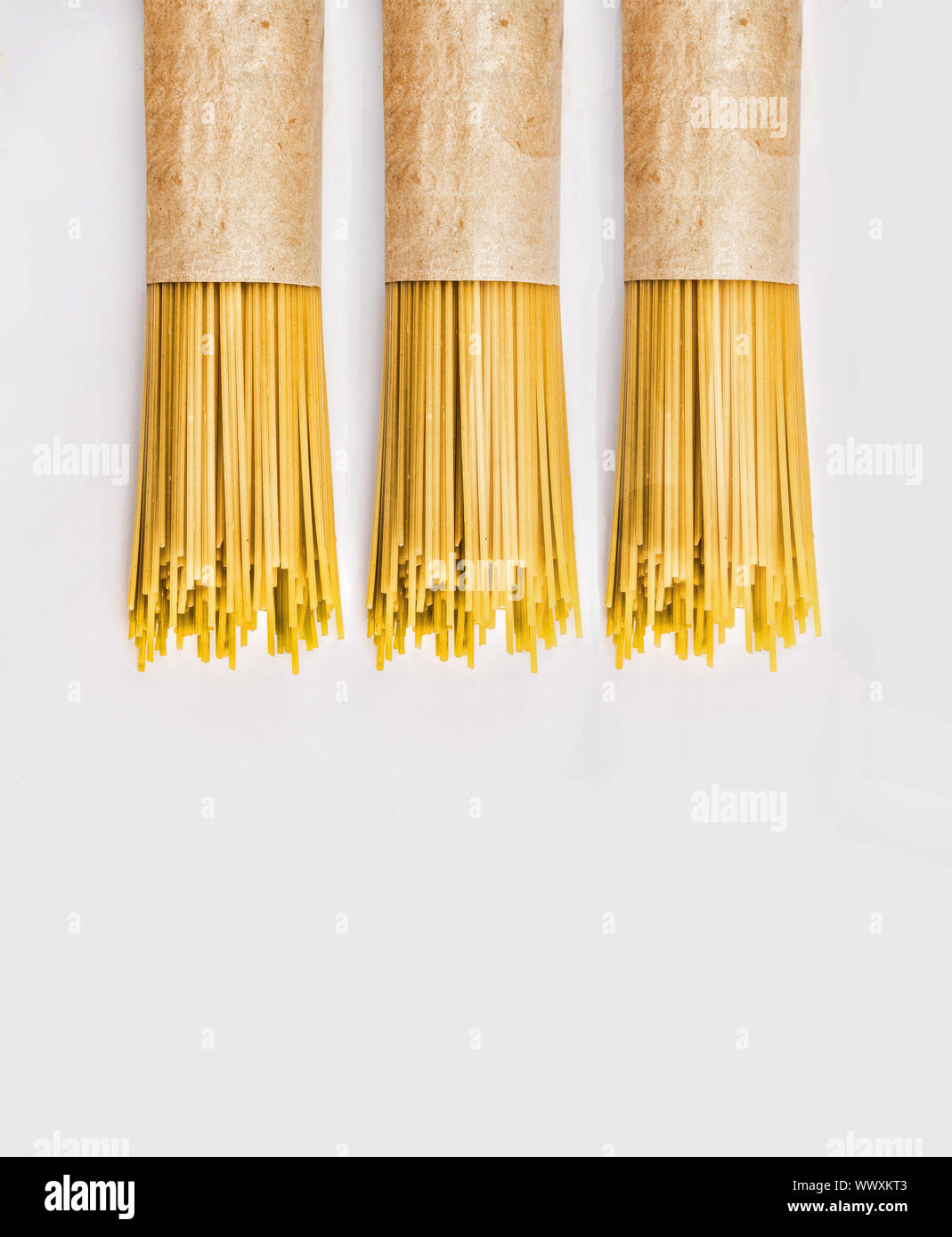 Spaghetti packed into paper on a white background. Supermarket Stock ...