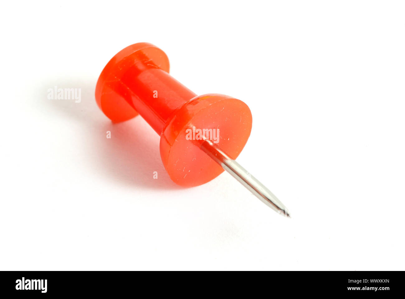 red push pin isolated on white background Stock Photo - Alamy