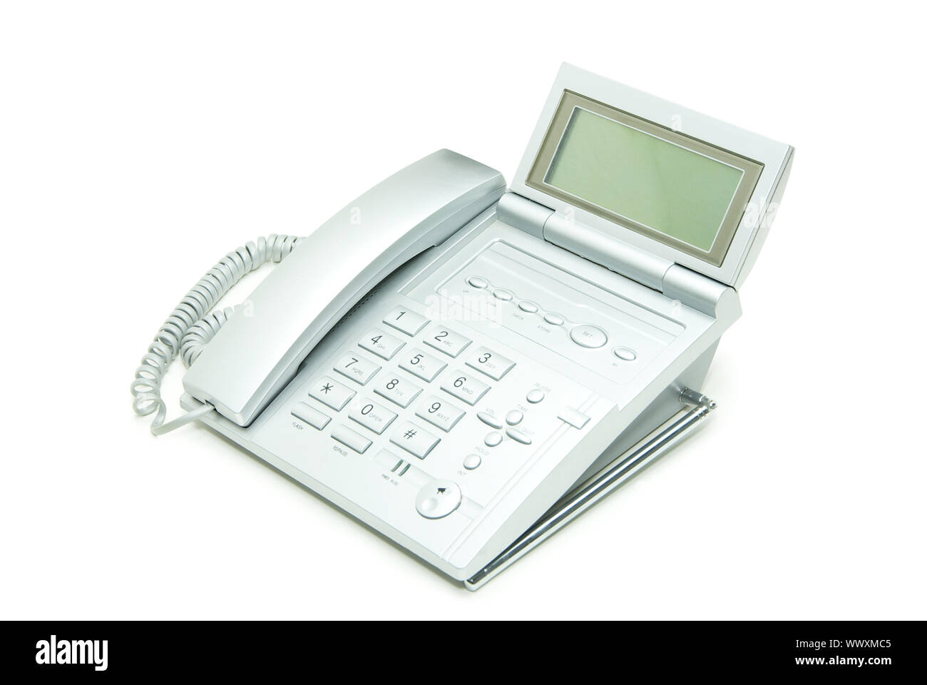 grey office telephone on a white background Stock Photo - Alamy