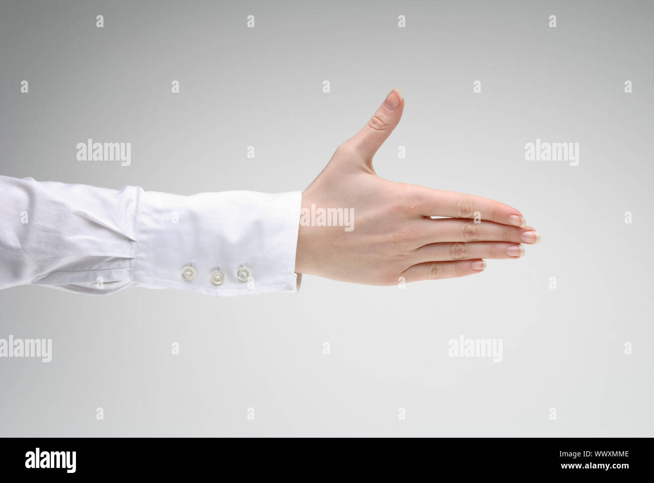 Woman extends hand palm hi-res stock photography and images - Alamy