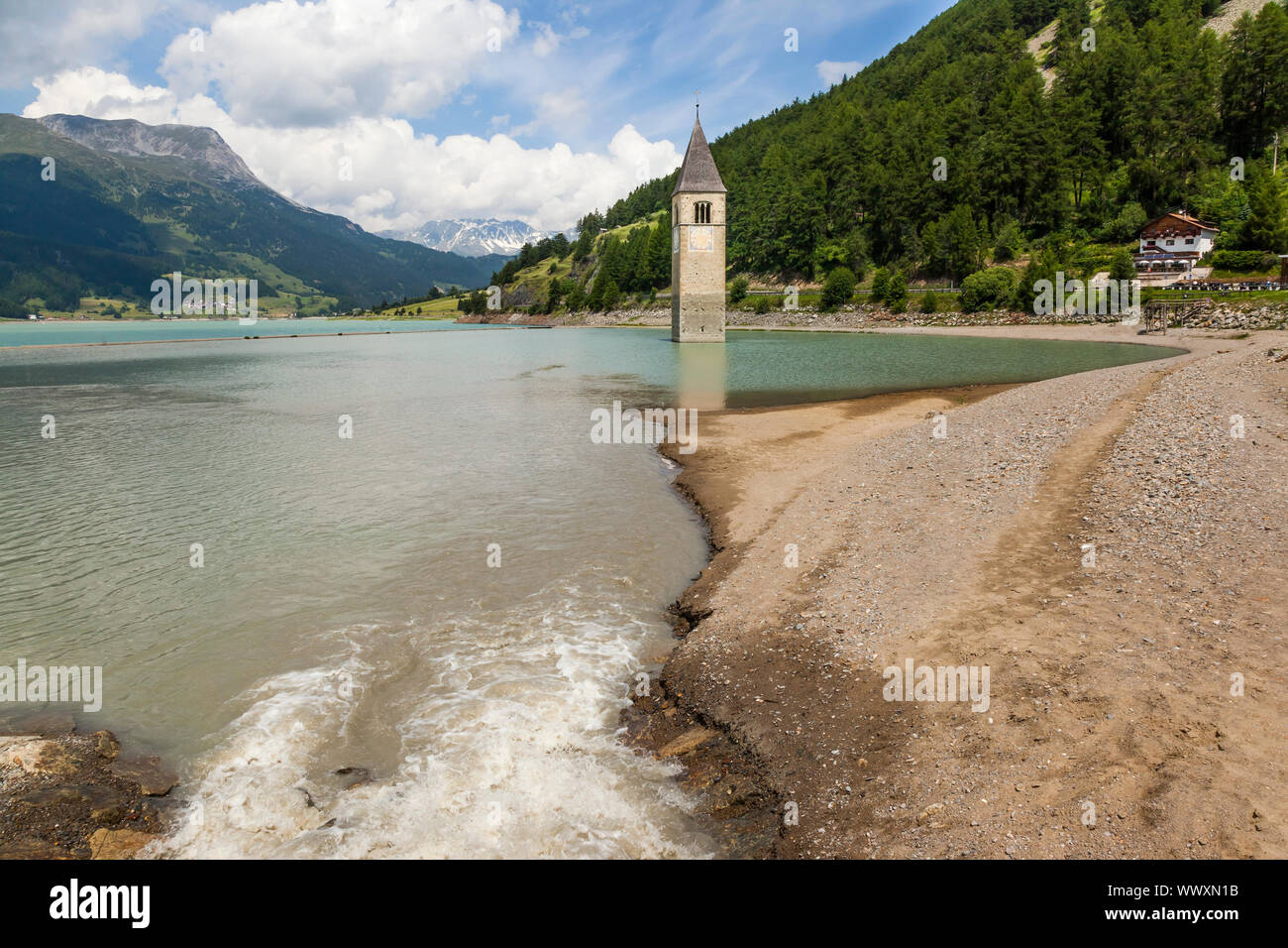 An image of the church tower in the Reschensee Italy Stock Photo - Alamy